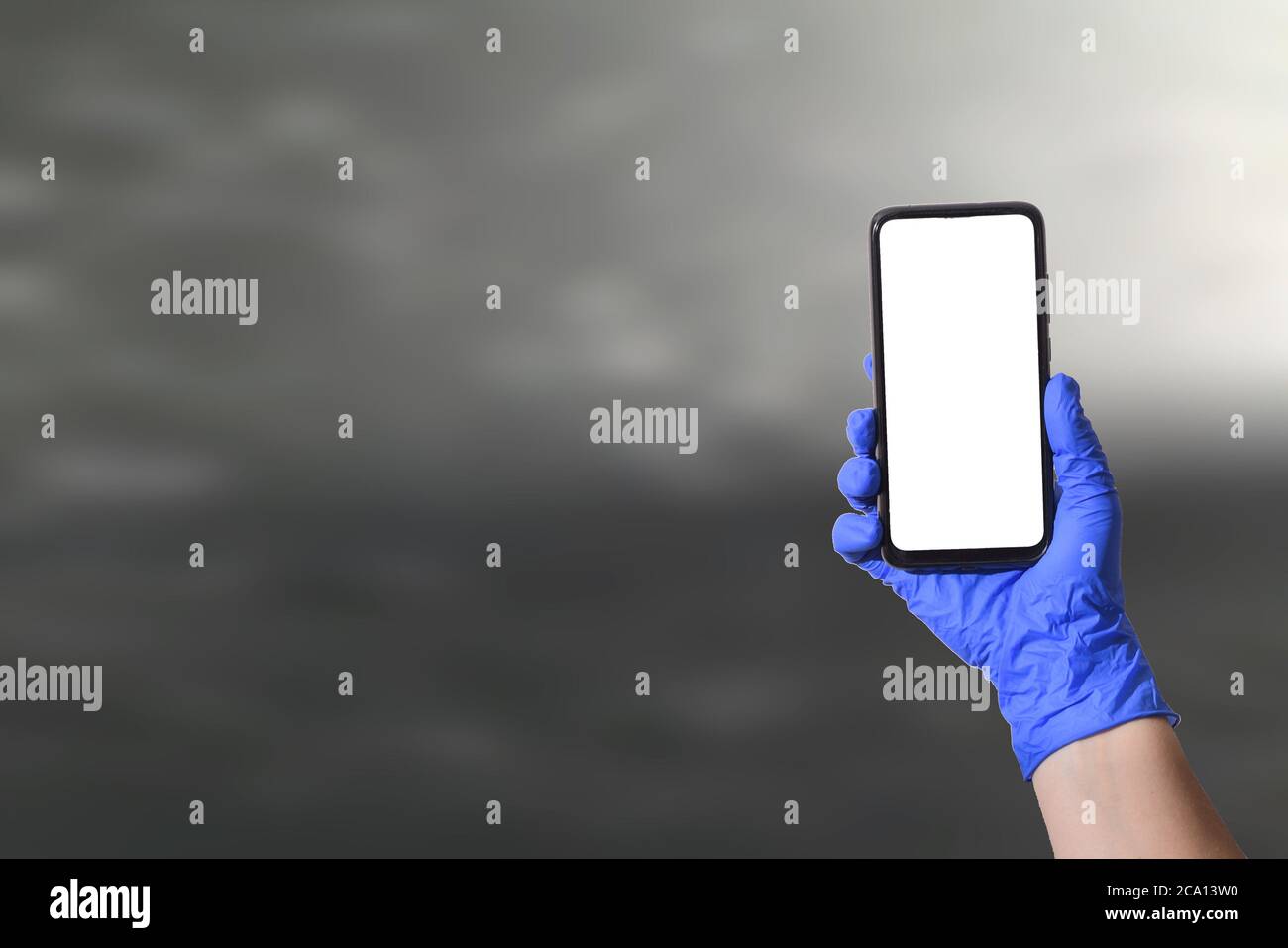 Smartphone in hand Stock Photo - Alamy