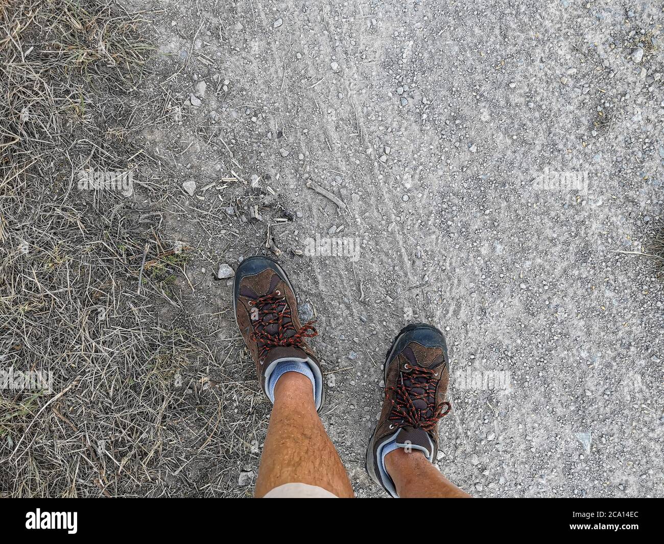 Feet of the traveler in hiking shoes Stock Photo - Alamy