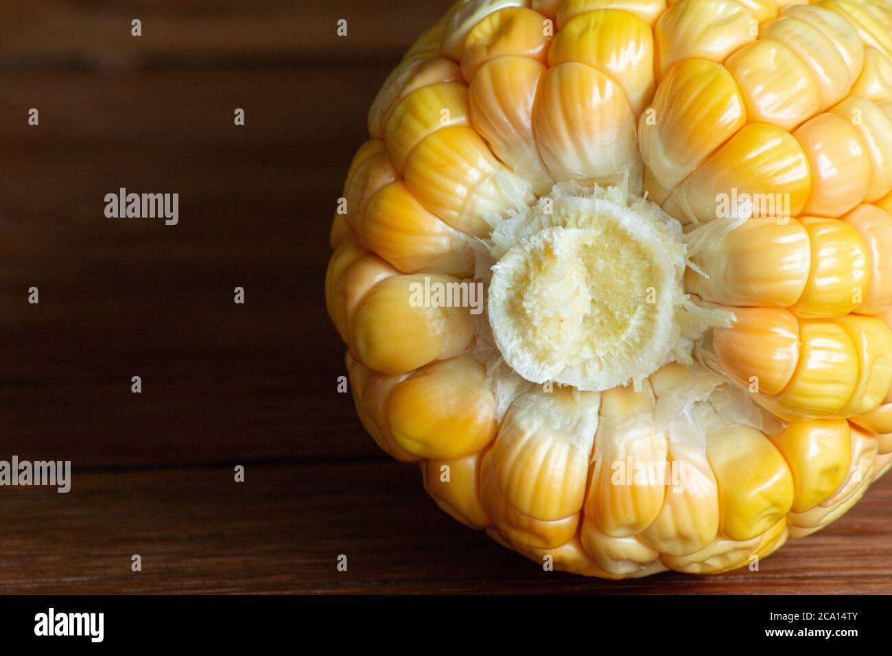 Corn cob on dark wooden rustic background. Detail texture. Macro Stock ...