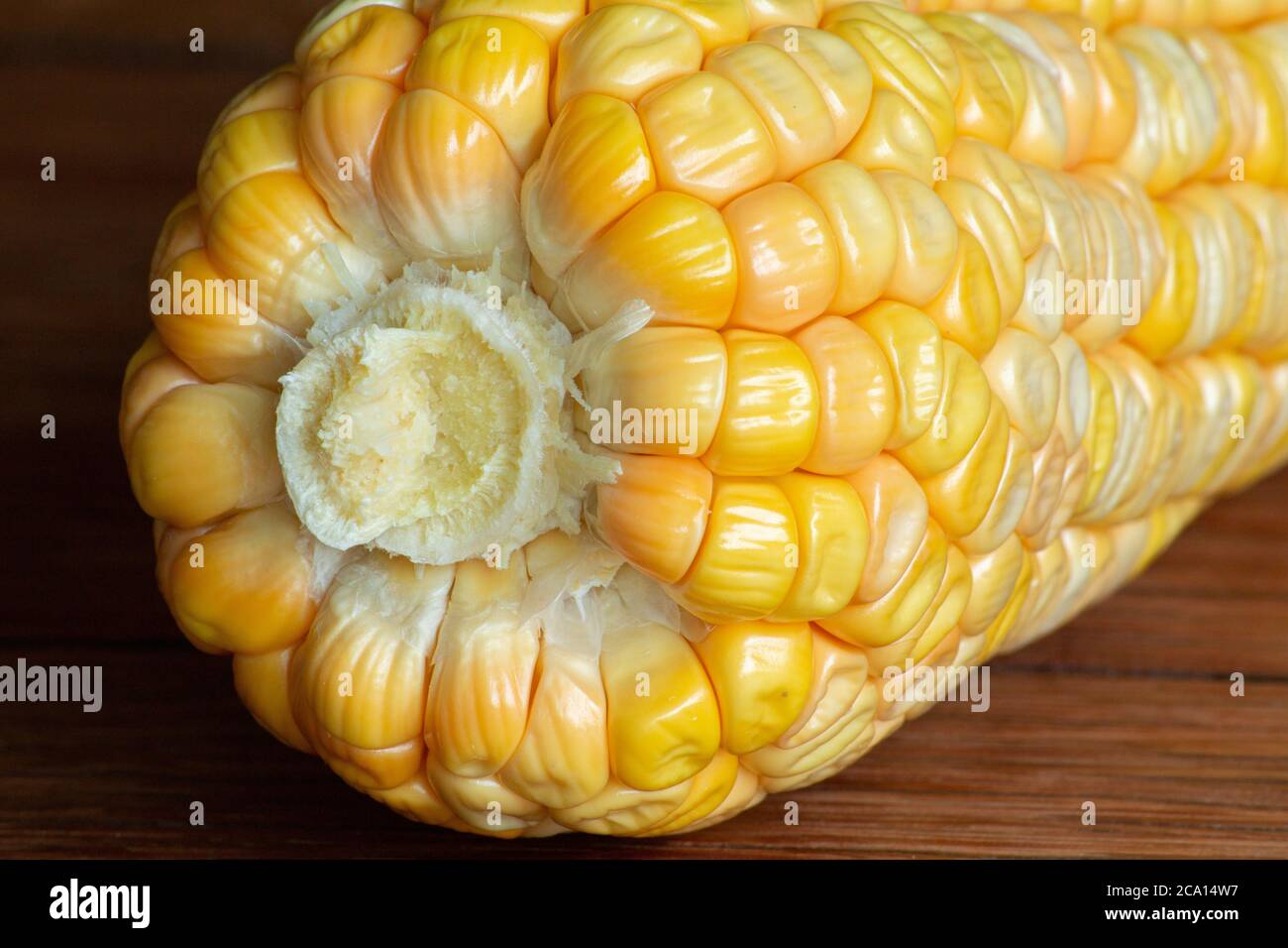 Corn cob on dark wooden rustic background. Detail texture. Macro Stock ...