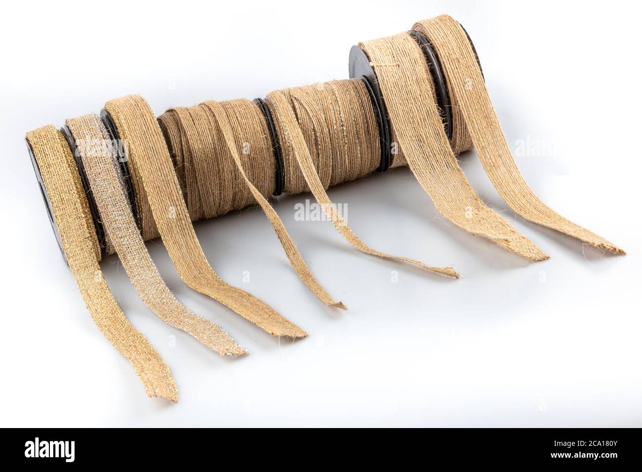 Colored jute ribbon rolls isolated on white background. Natural Braided ...