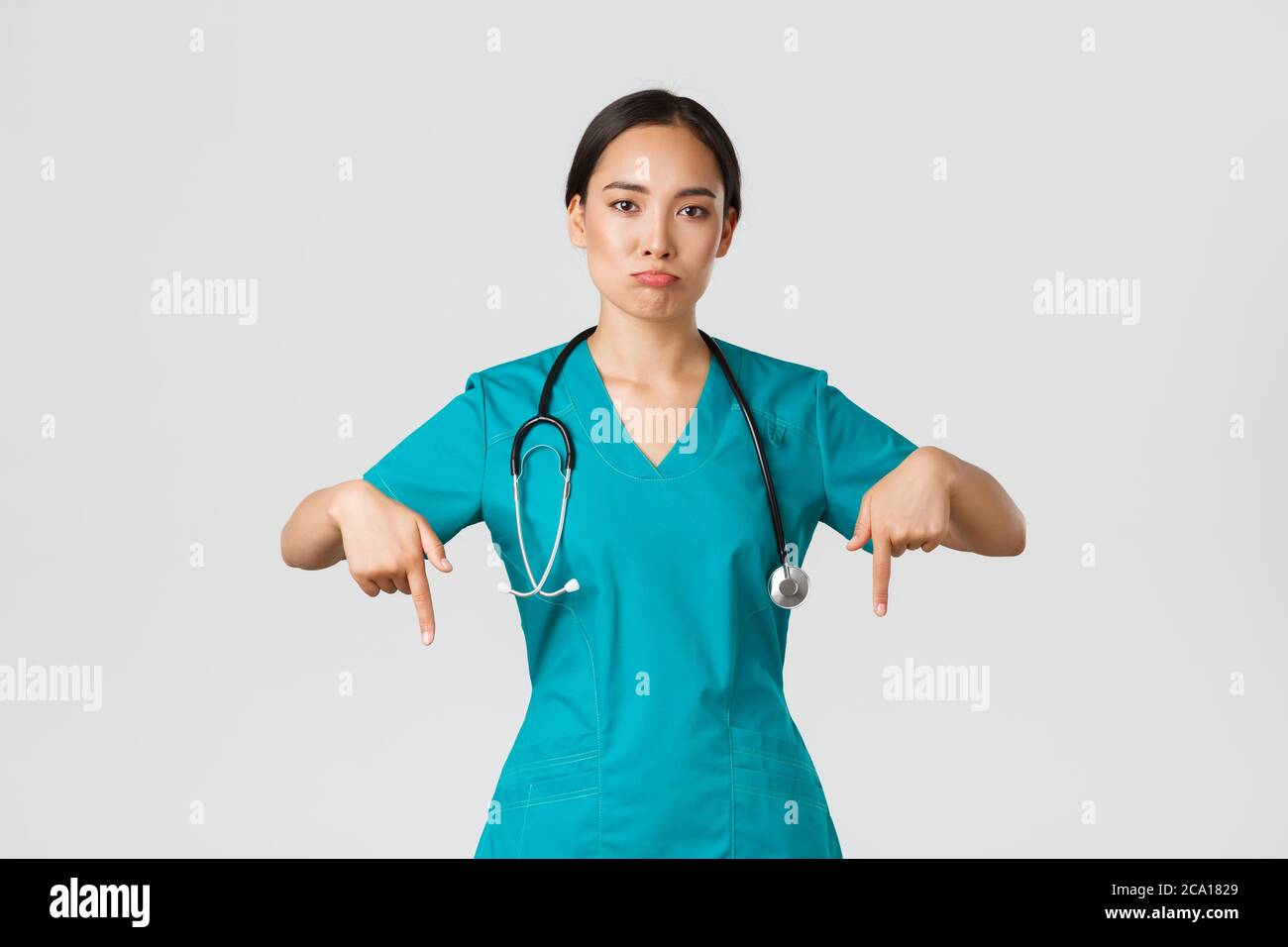 Upset patient pointing at nurse hi-res stock photography and images - Alamy