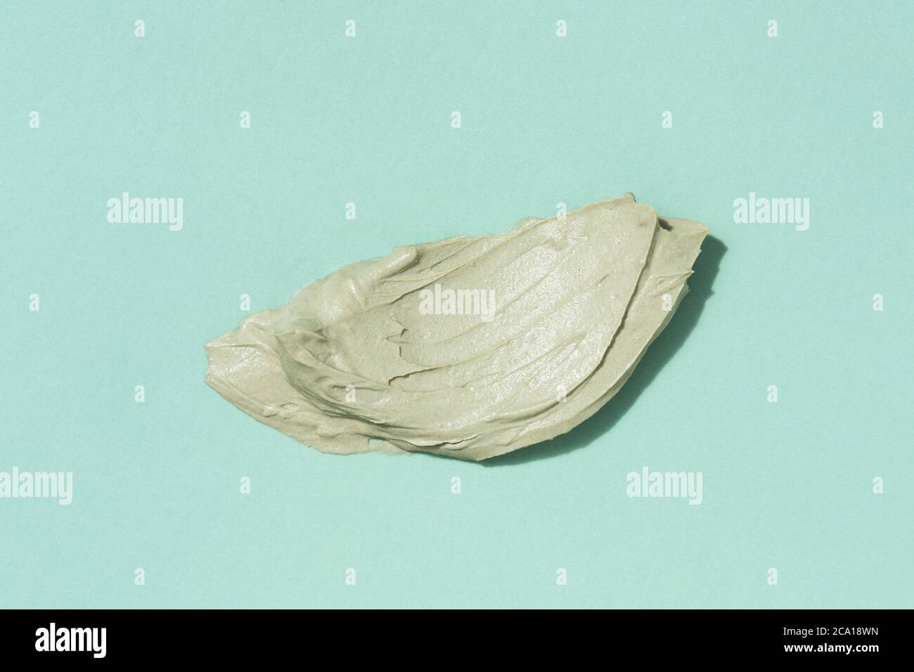 Smear of green clay face mask. Top view Stock Photo - Alamy