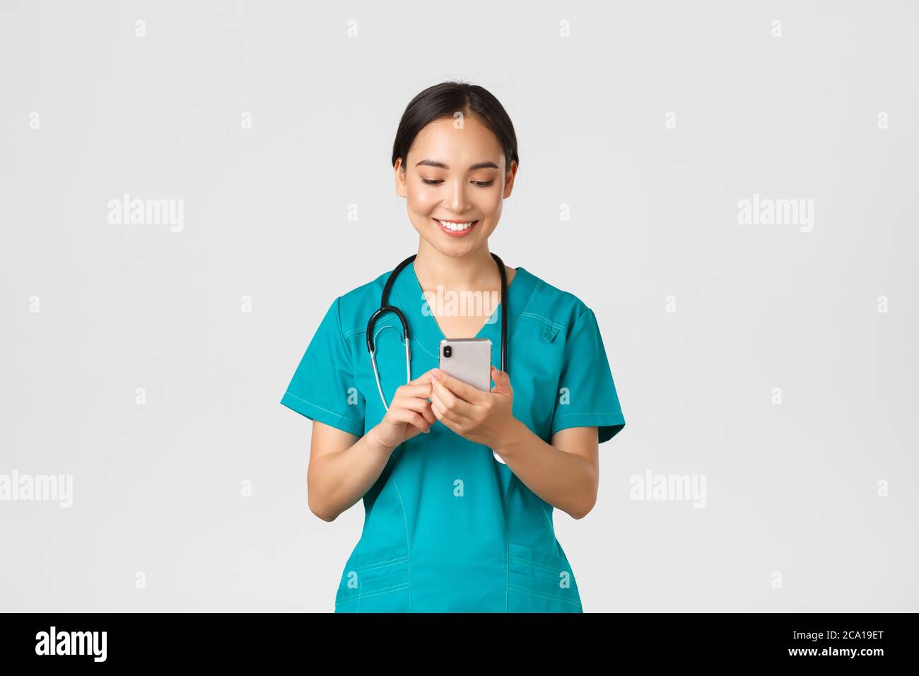 Covid-19, healthcare workers and preventing virus concept. Smiling ...