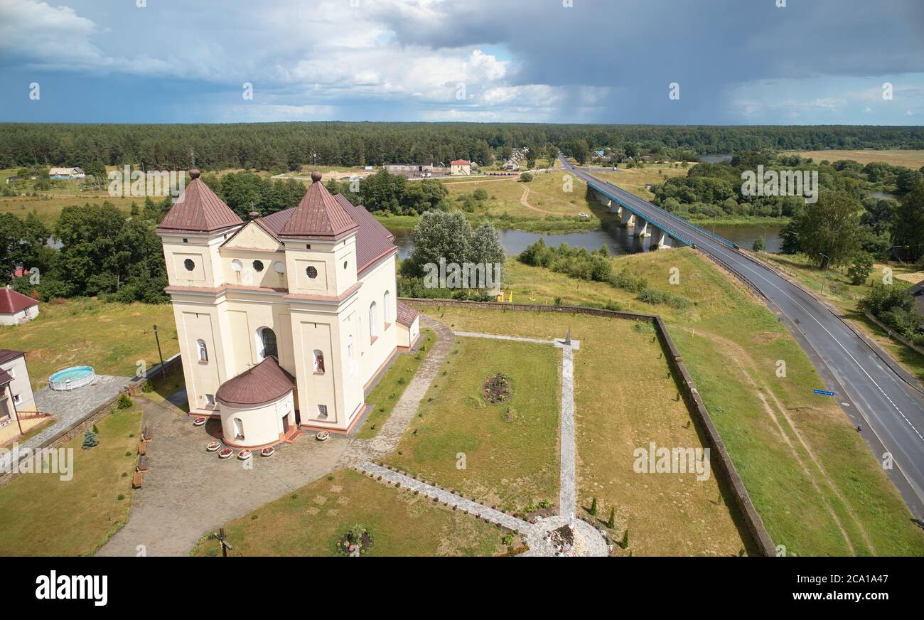 Brown church in town landscape with bridge aerial view Stock Photo - Alamy