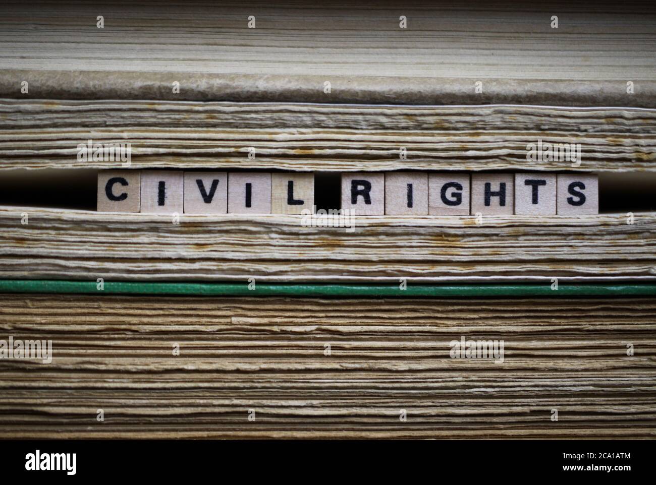 Civil rights restriction concept: Closeup of isolated antique old book ...