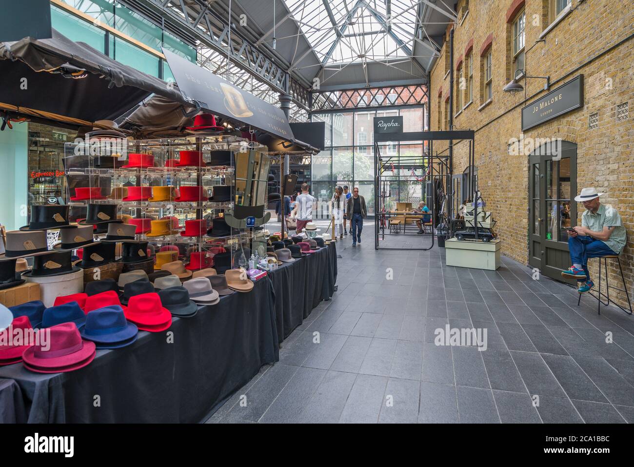 Hat sellers stall in Spitalfields market, London, England, UK Stock ...