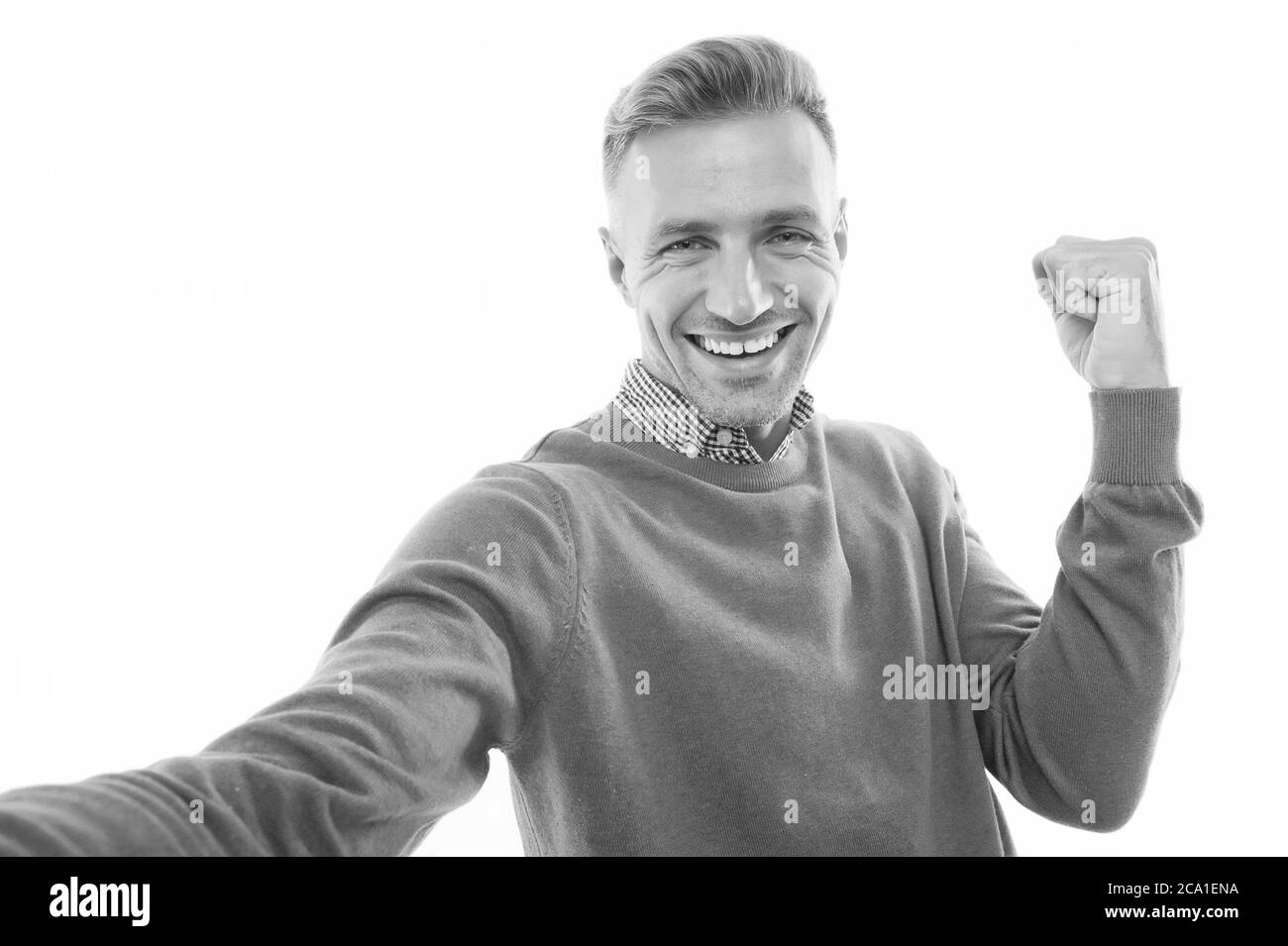 Happy winner. Happy guy make winner gesture isolated on white. Happy ...