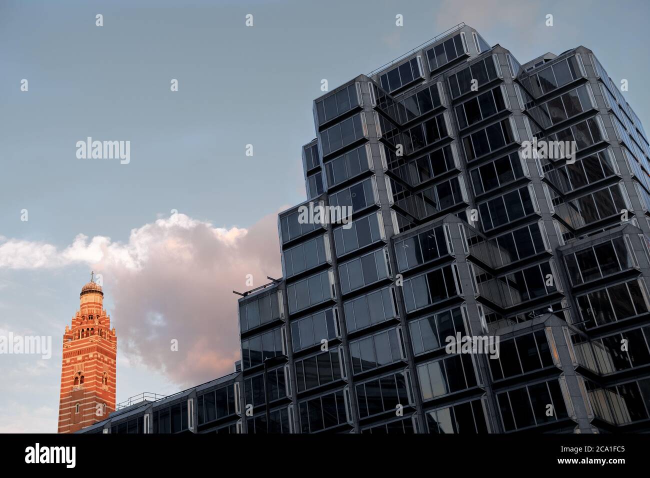 Westminster Cathedral clock tower from street level between modern ...