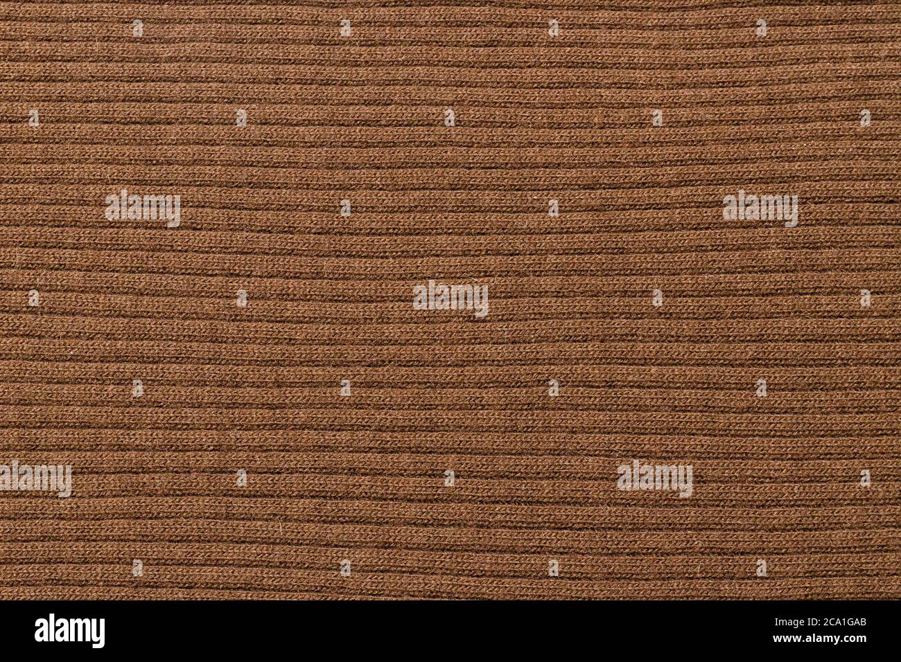 Brown ribbed texture. Knitted fabric Stock Photo - Alamy