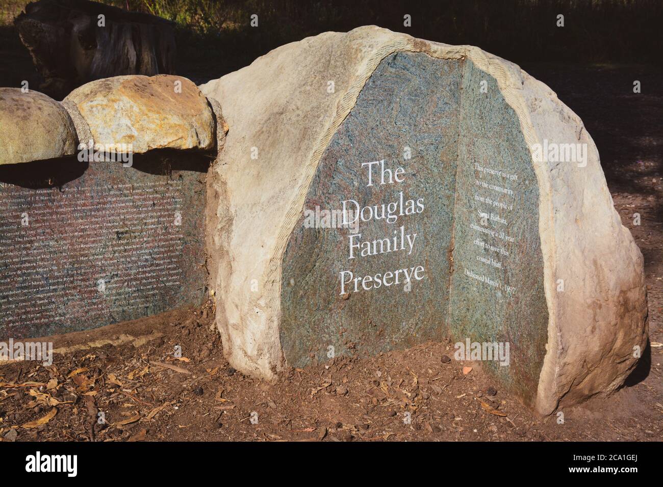 An inscription for the Douglas Family Preserve dedications are carved ...