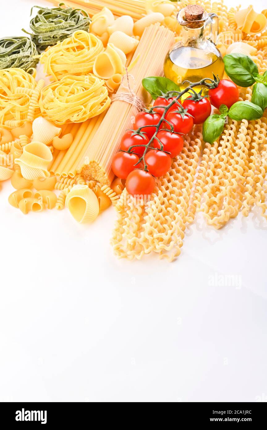 A group of different types of Italian pasta. Pasta with fresh tomatoes ...