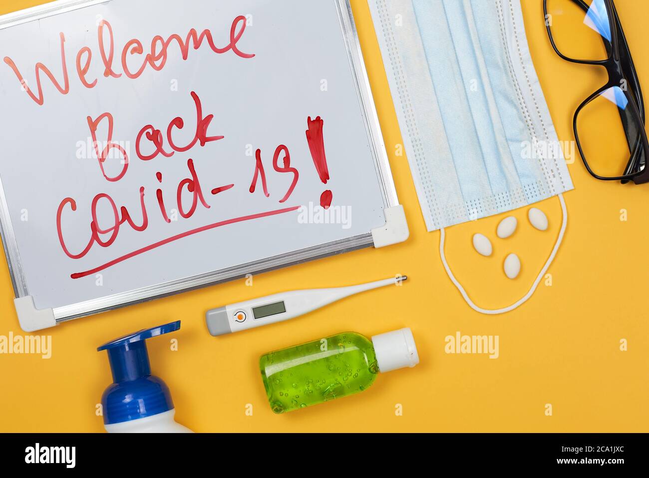 Welcome back covid-19. Liquid antibacterial soap, antiseptic gel bottle ...