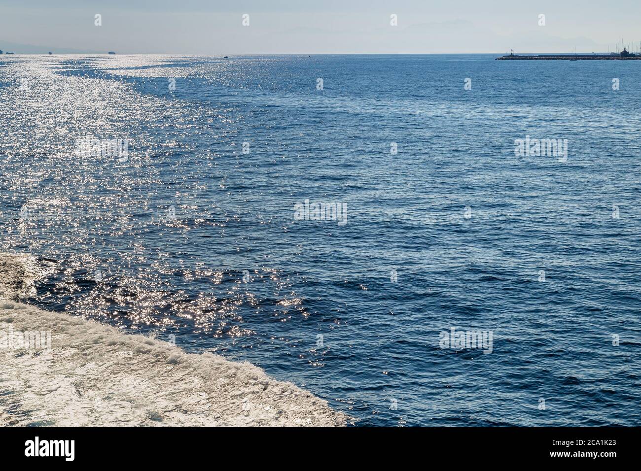 sun shining on sea waves Stock Photo - Alamy