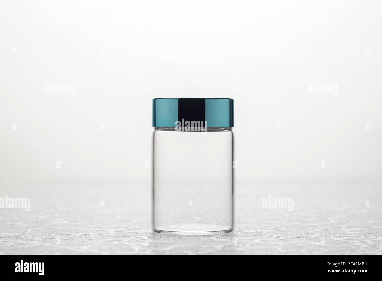 Still life of glass jars with lids Stock Photo - Alamy