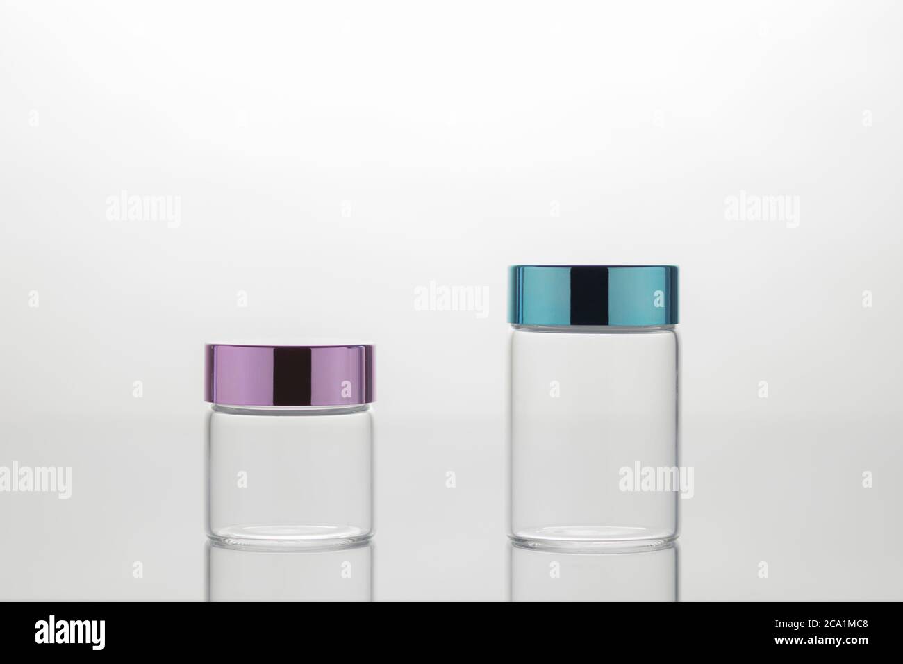 Still life of glass jars with lids Stock Photo - Alamy