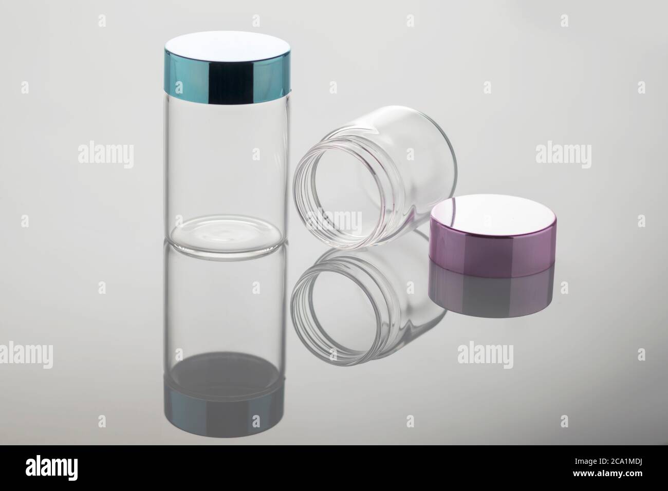 Still life of glass jars with lids Stock Photo - Alamy