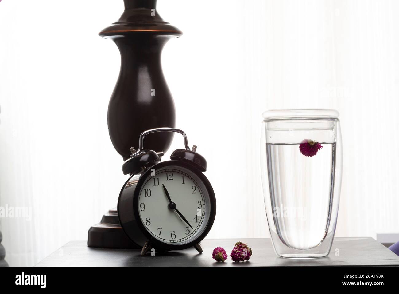 empty glass cup on a white background Stock Photo - Alamy