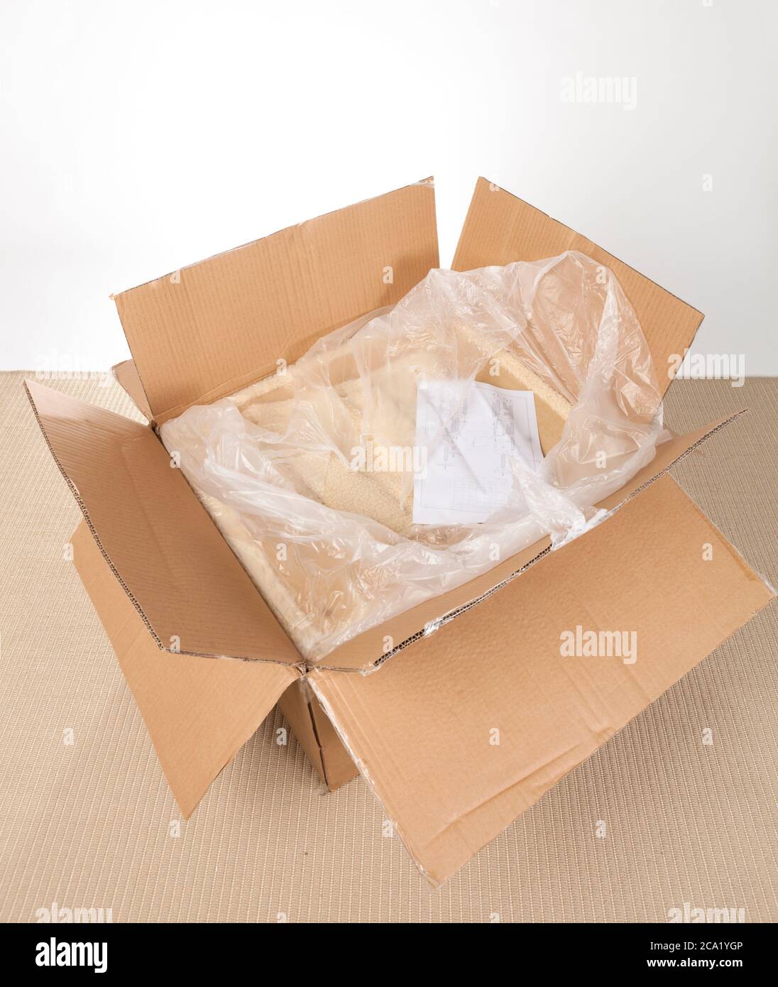 cardboard box isolated on white Stock Photo - Alamy