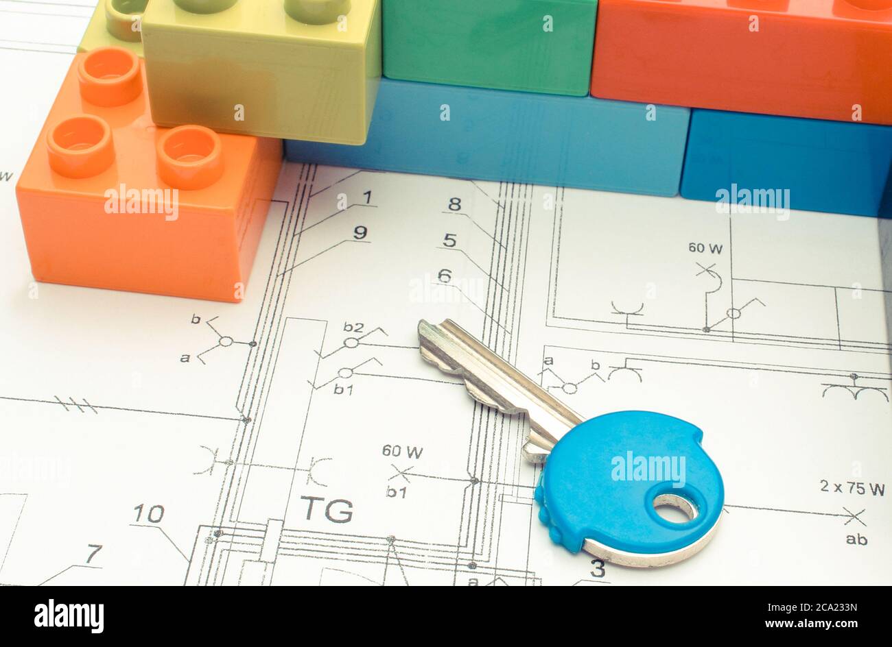 Wall of colorful building blocks and home keys lying on construction ...