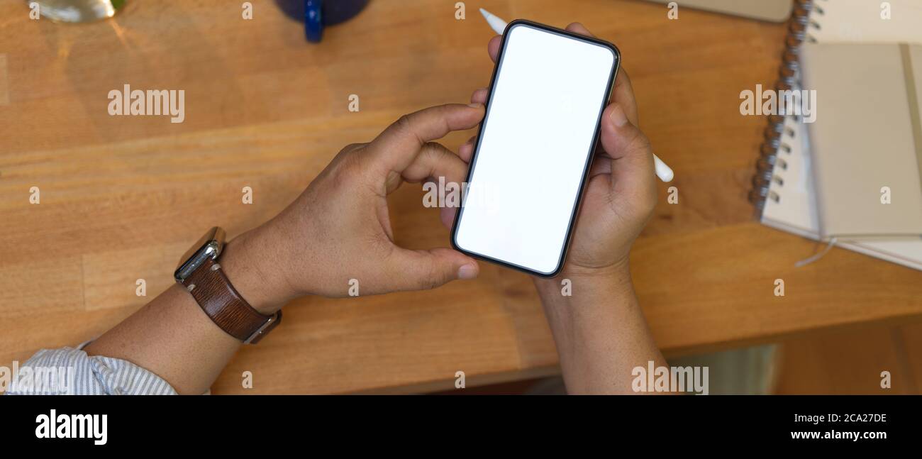Overhead shot hands holding hi-res stock photography and images - Alamy