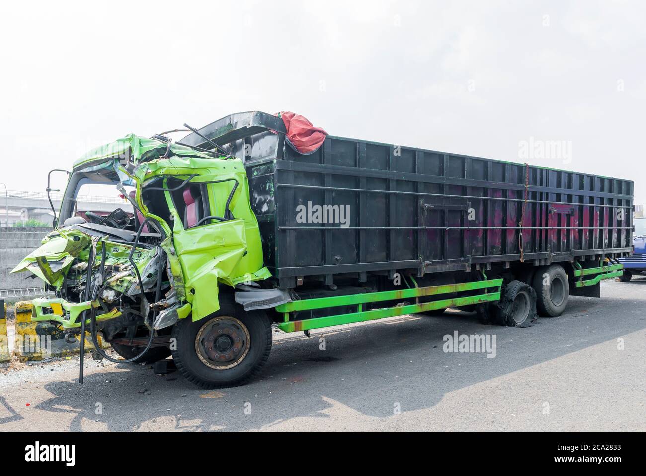 Broken truck because of the crash accident on the road Stock Photo - Alamy