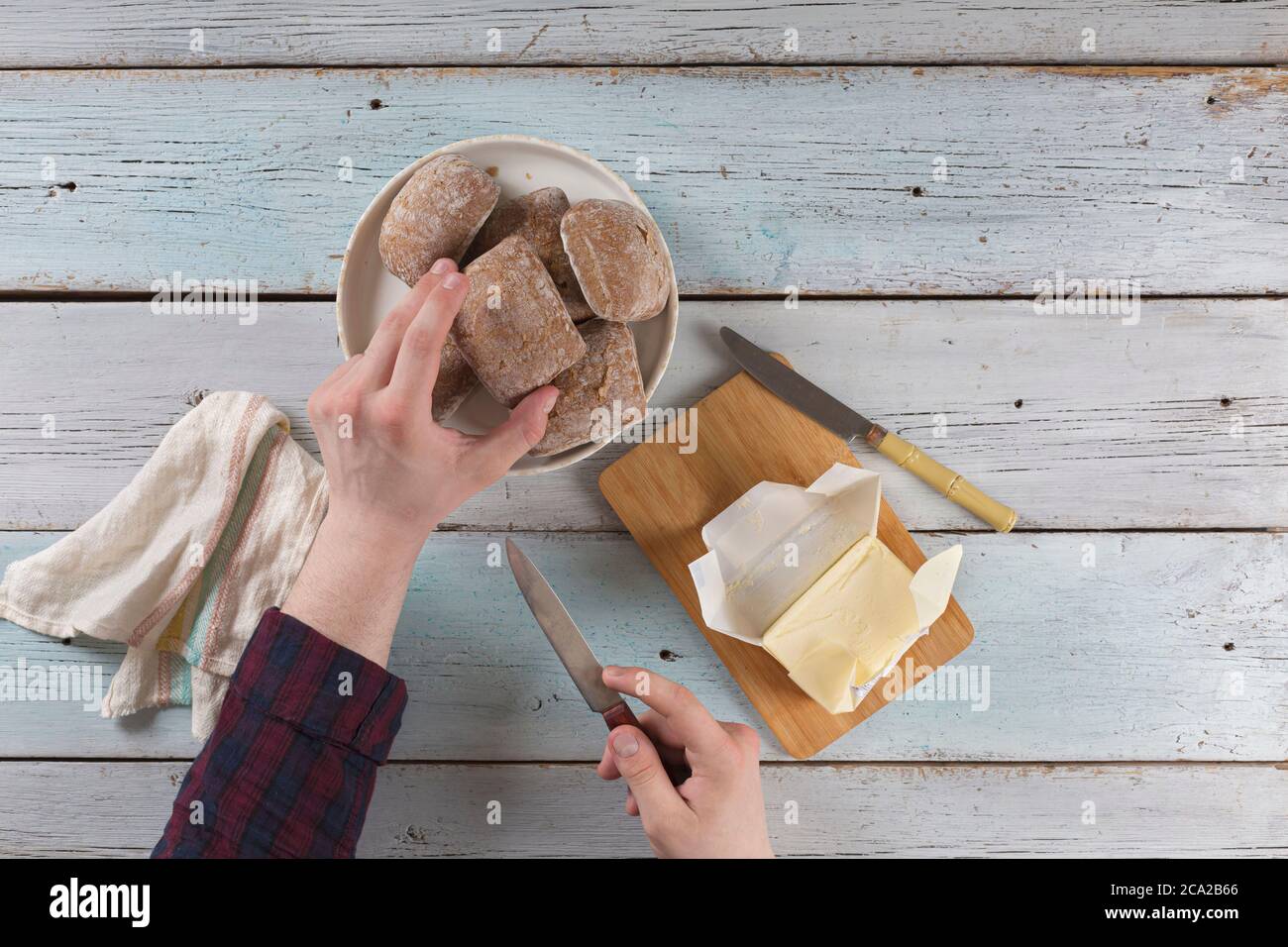 Too much butter on toast man hi-res stock photography and images - Alamy