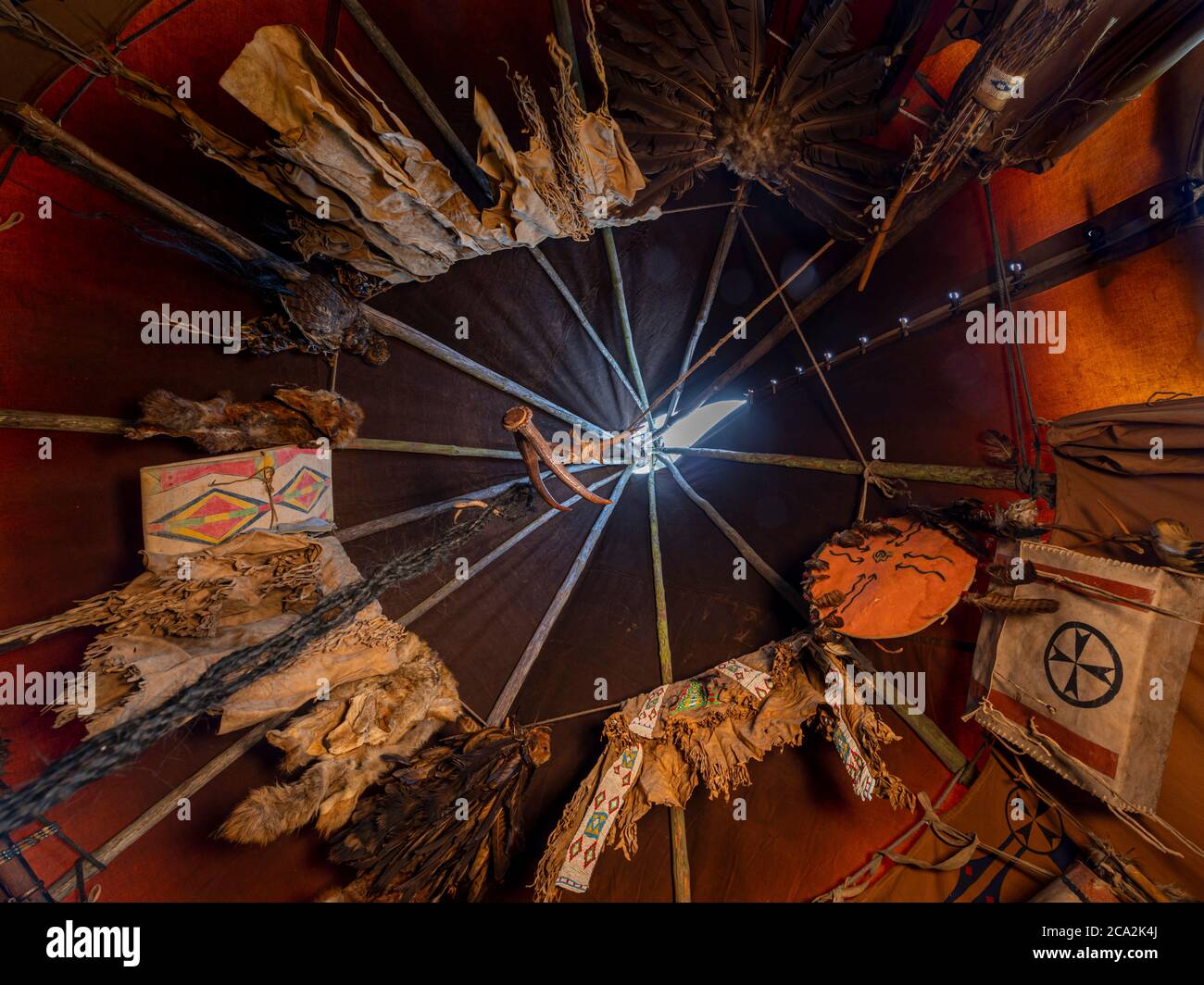 Interior view ,looking up, of an Indian tipi with traditional leather ...