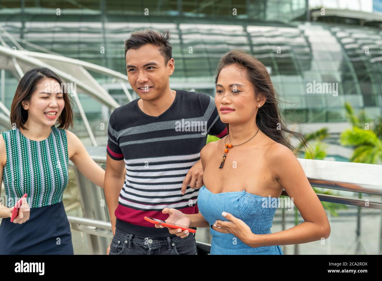 Three young chinese men hi-res stock photography and images - Alamy