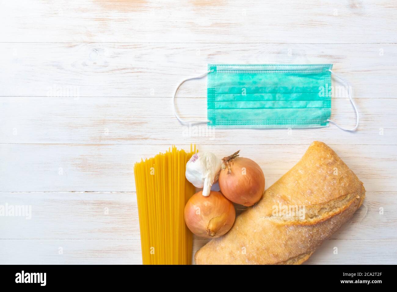 Donations food, vegetables, pasta, bread, and protective face mask ...