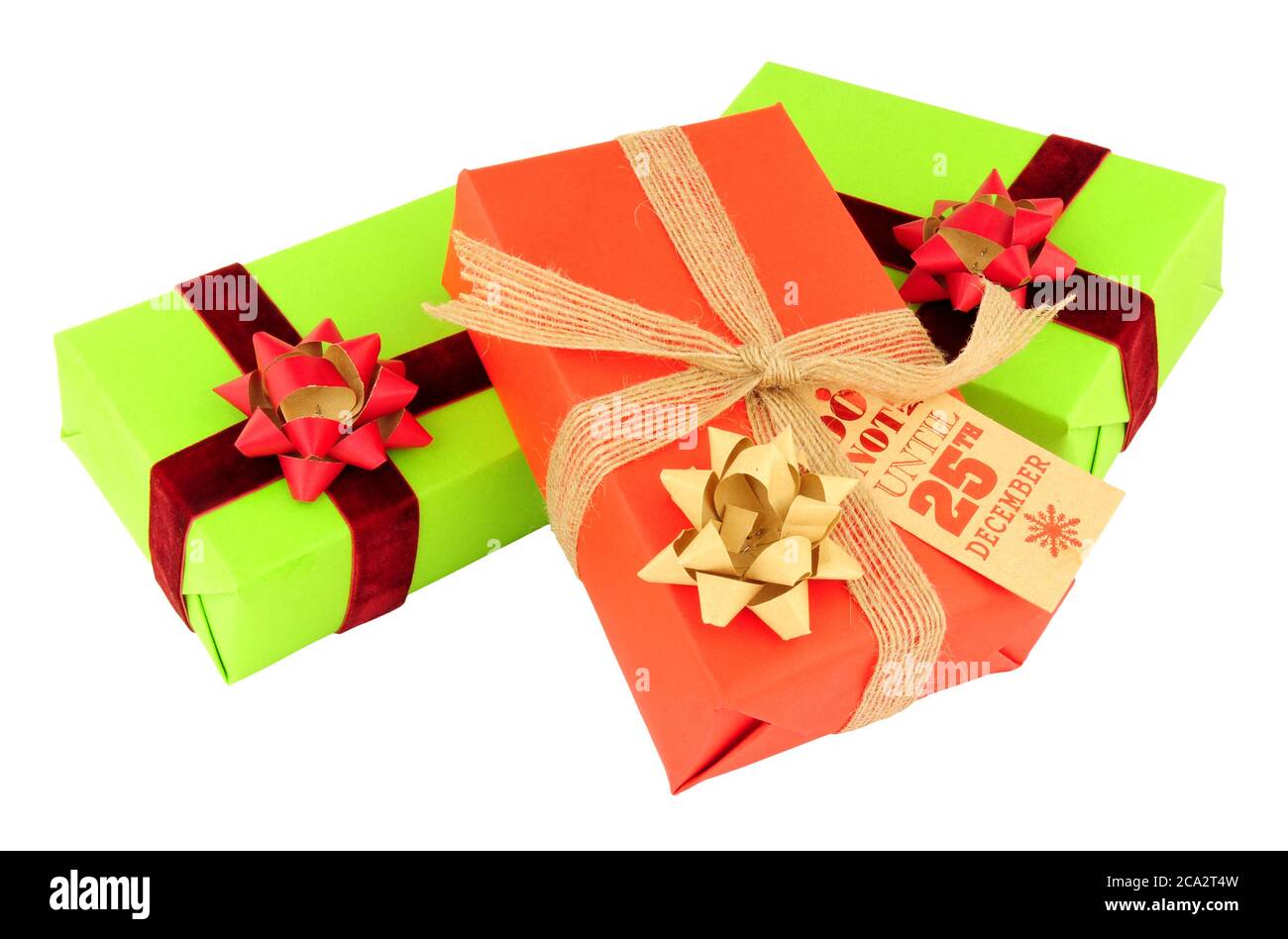 Christmas parcels wrapped in red and green paper with ribbons and bows ...