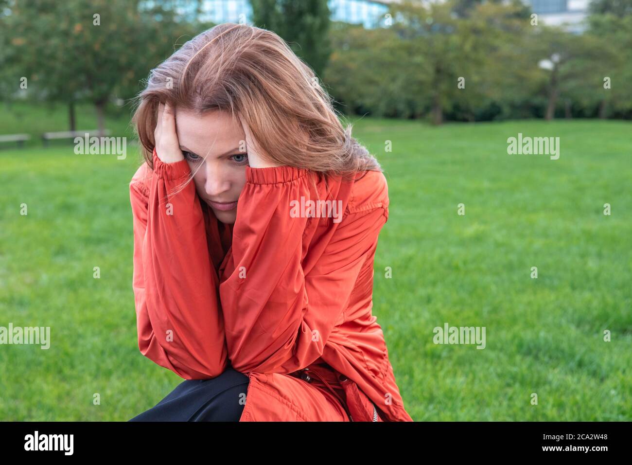 Sad Woman Sitting In Park Holding Head Depressed Woman Alone In