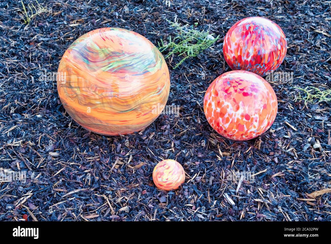 Planets abstract. Colourful balls on the ground Stock Photo - Alamy