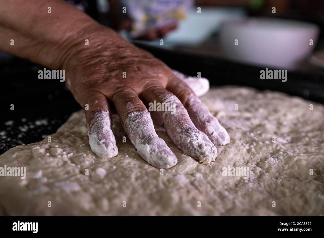 Hand stretched dough hi-res stock photography and images - Alamy