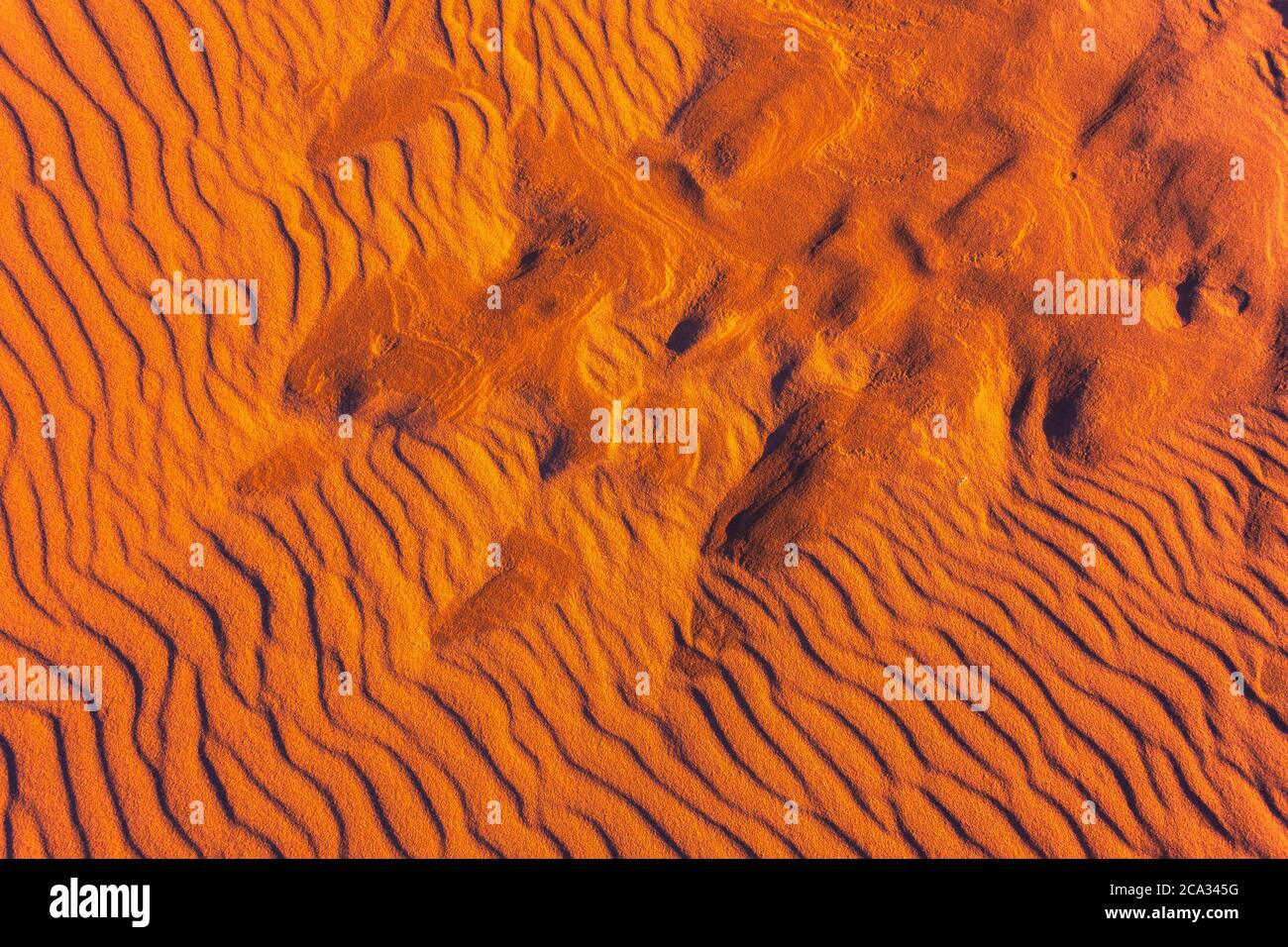 Desert and sand ripples in warm evening sunlight, texture Stock Photo ...