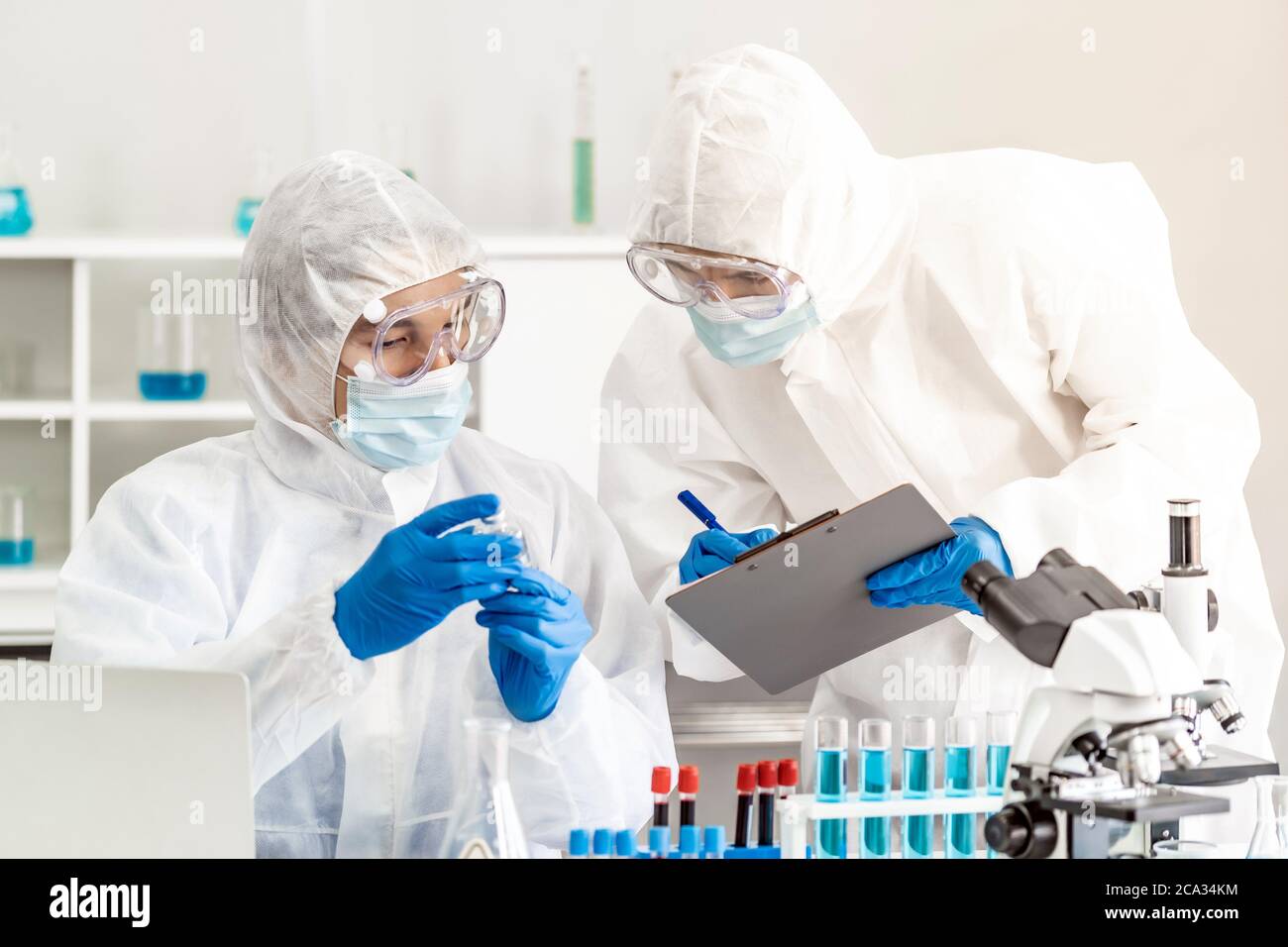 Personal protective equipment suits hi-res stock photography and images ...