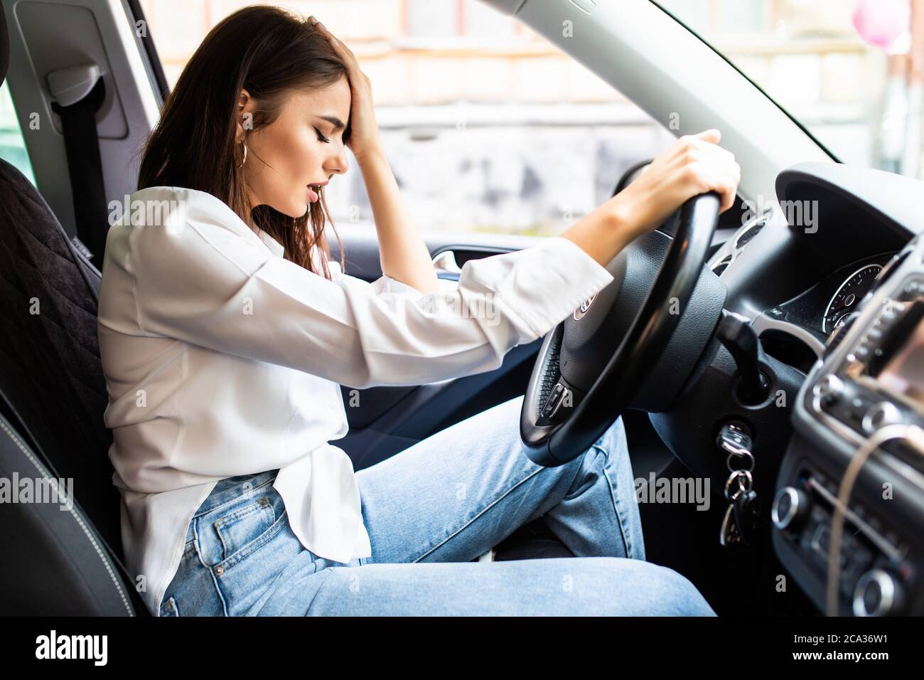 Sad one woman car hi-res stock photography and images - Alamy