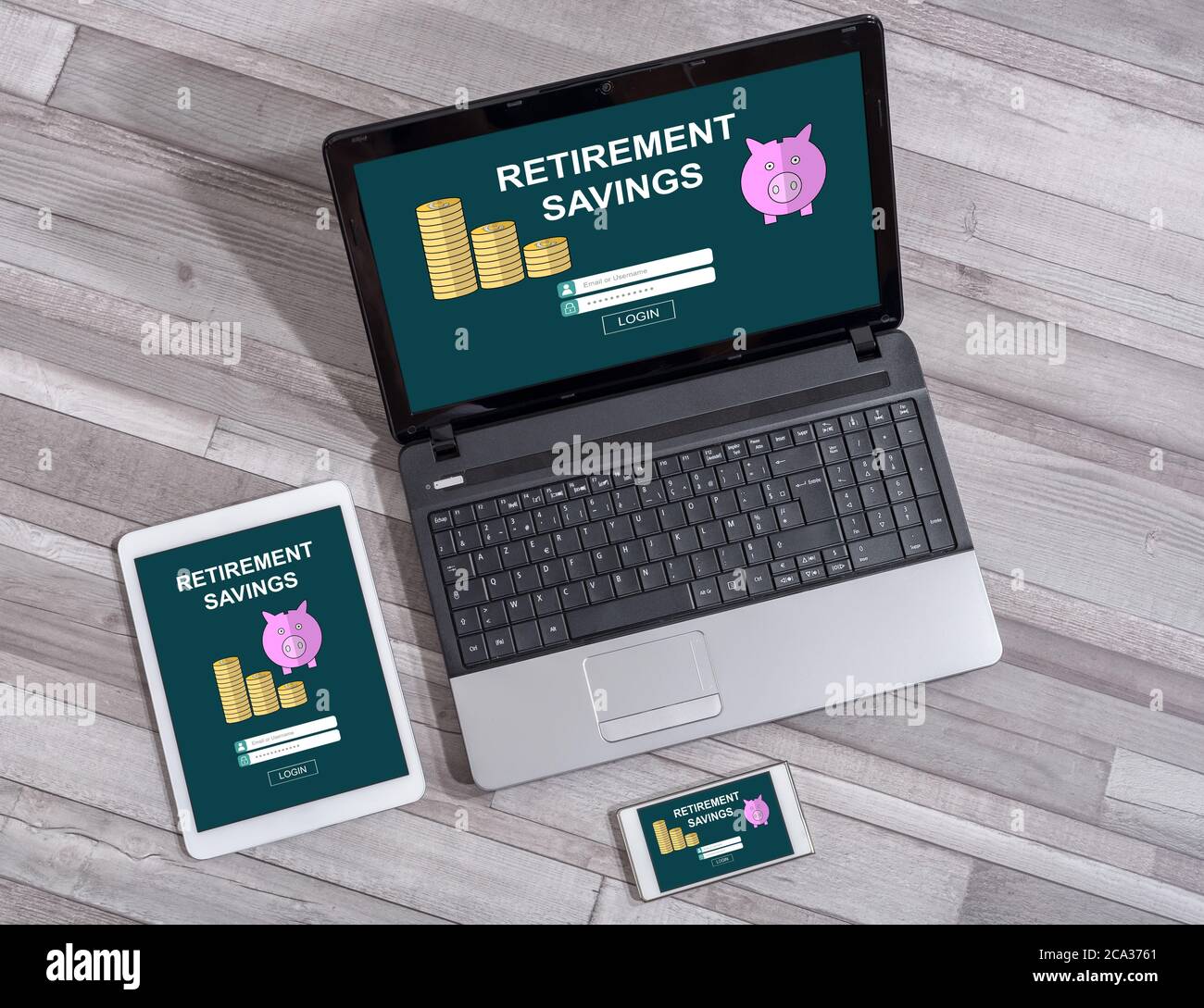 Retirement savings concept shown on different information technology ...