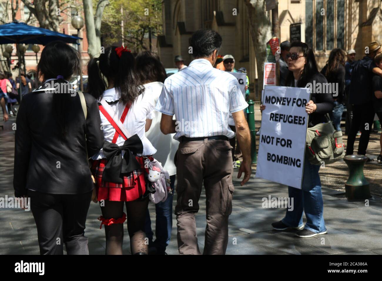 'Hands Off Syria' protesters gathered outside Sydney Town Hall to ...
