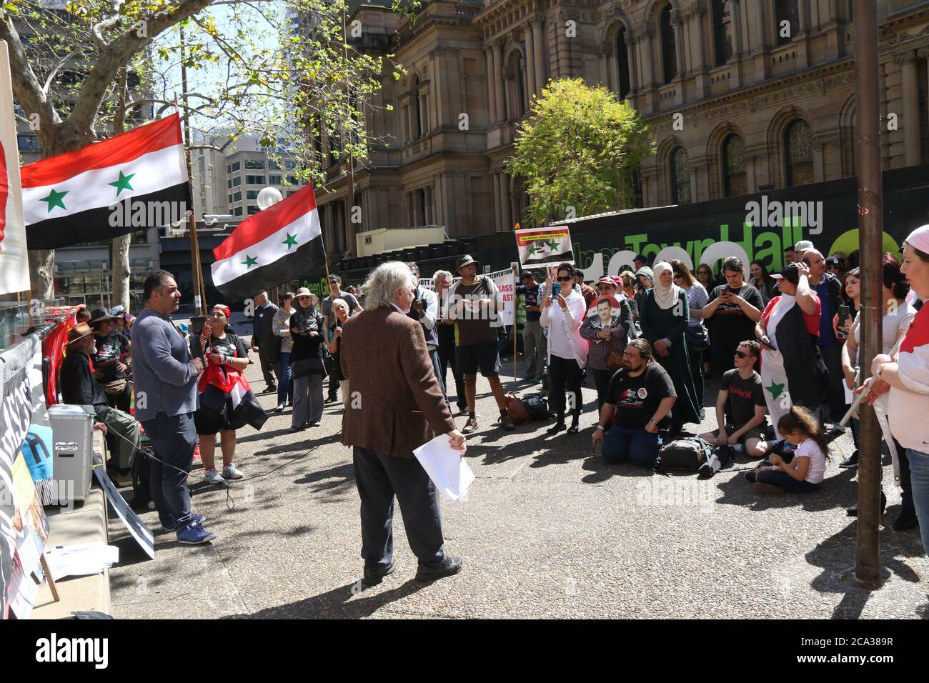'Hands Off Syria' protesters gathered outside Sydney Town Hall to ...