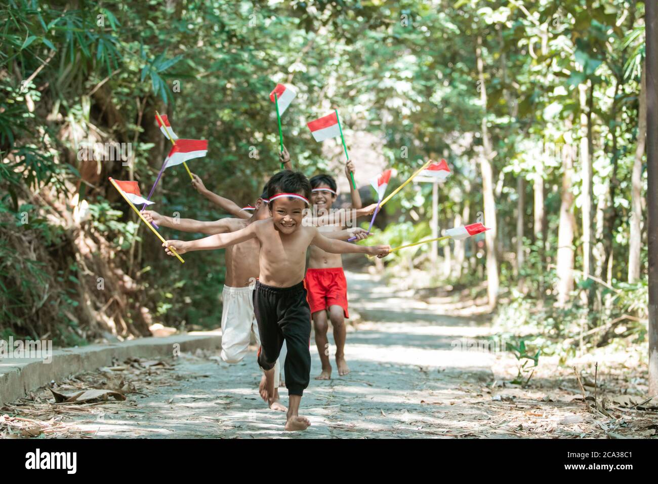 having fun group of kids running without clothes chasing each other ...