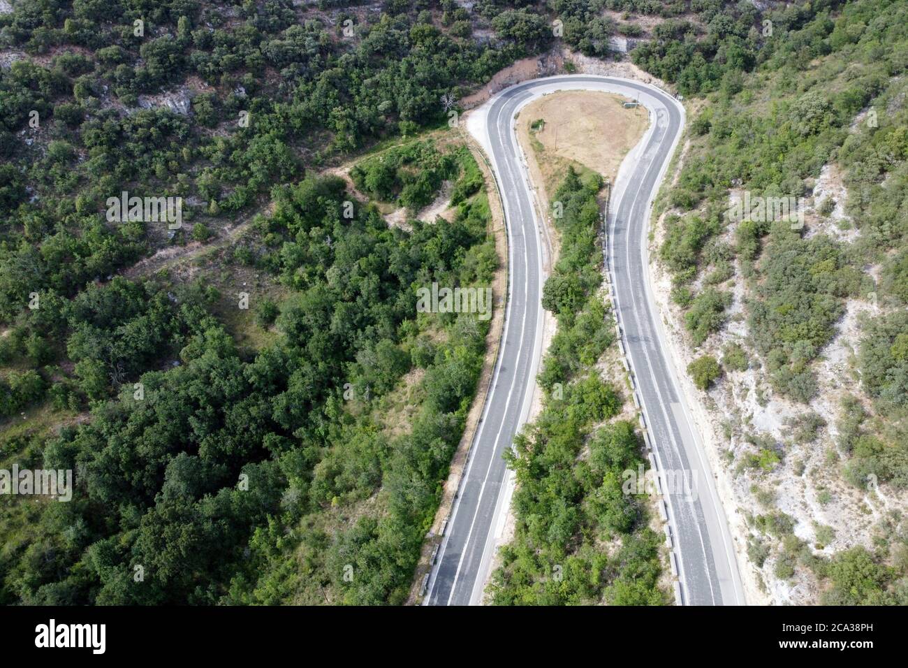 Aerial view of winding road hi-res stock photography and images - Alamy