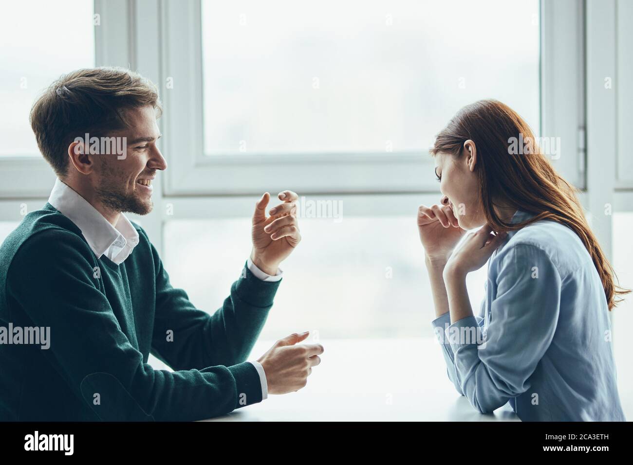 business manager man and young woman office friends communication fun ...