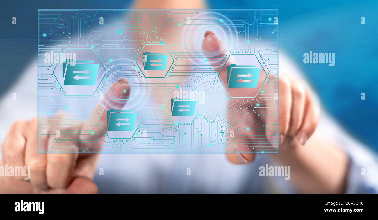 Woman touching a data exchange concept on a touch screen with her ...
