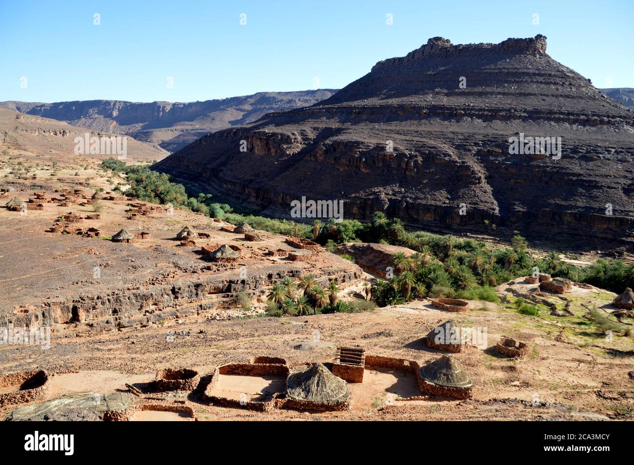 Algeria, Illizi, Tassili N'Ajjer National Park: Berber huts on the edge ...
