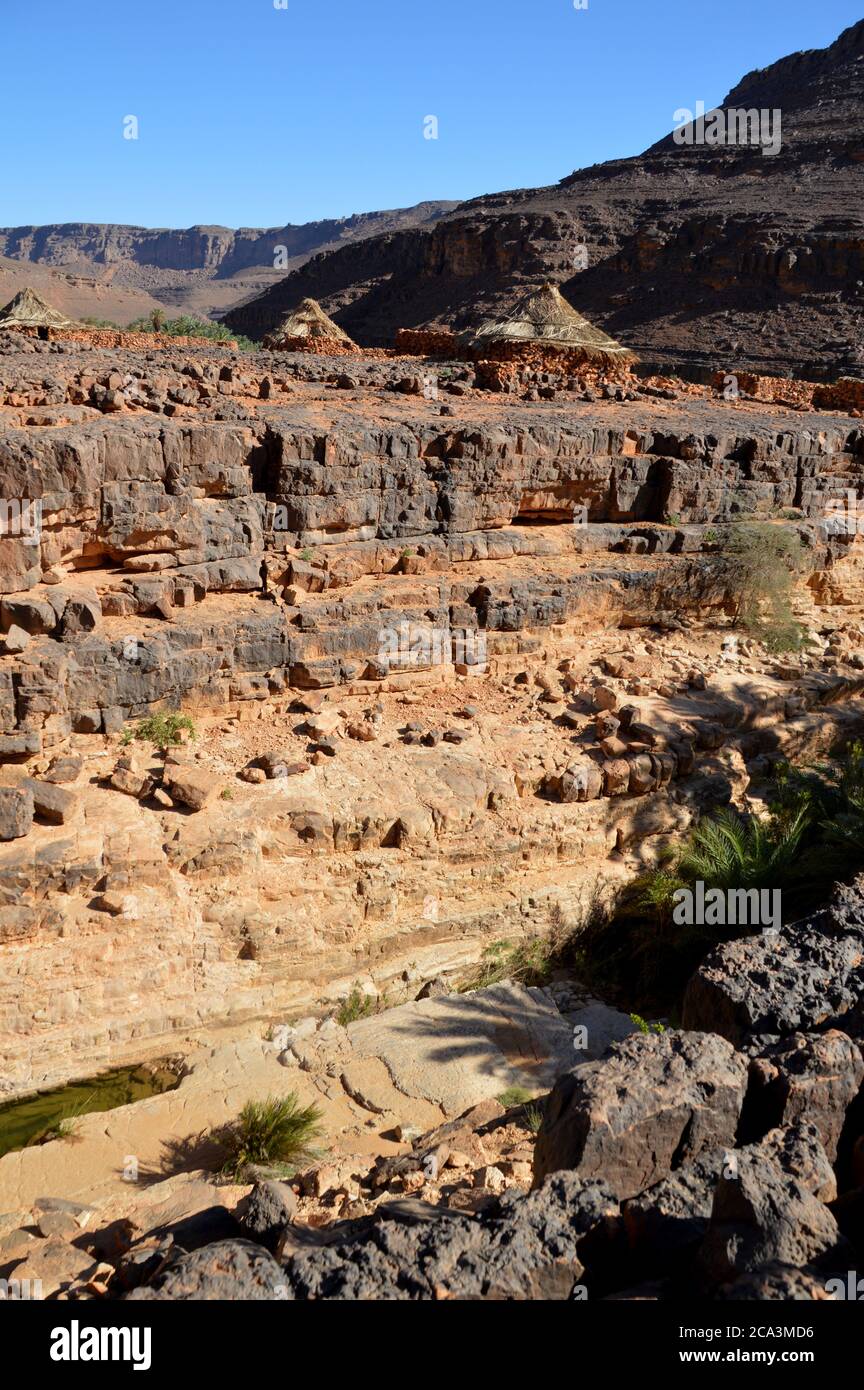 Algeria, Illizi, Tassili N'Ajjer National Park: Berber huts on the edge ...