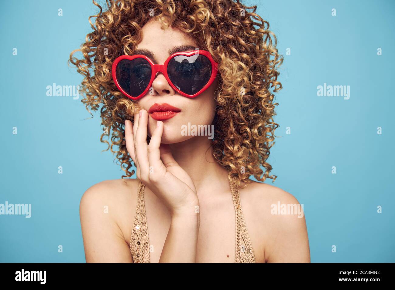 Impulsive girl expression of feelings on an isolated background, studio ...