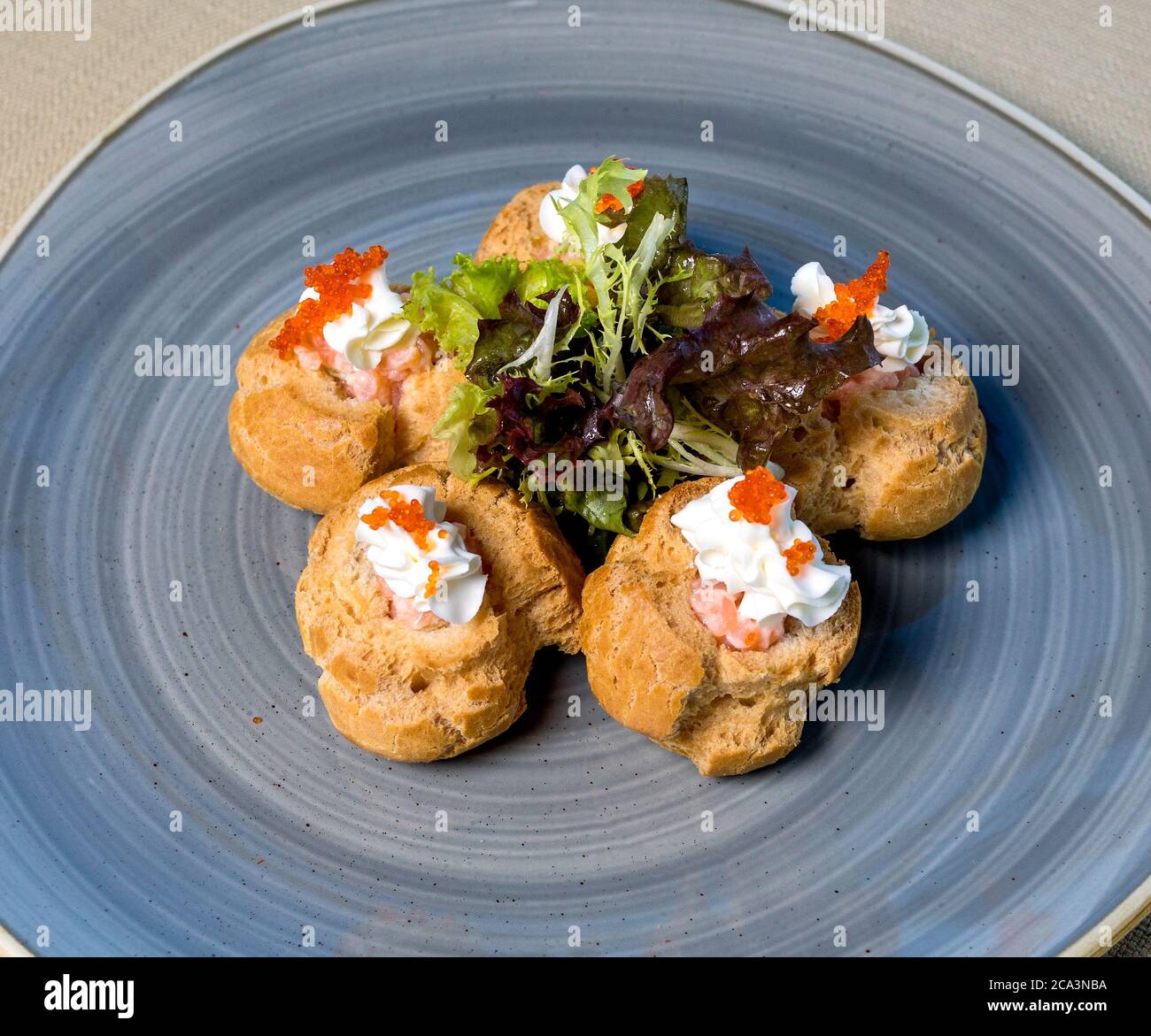 Fish caviar, cream garnish close up Stock Photo - Alamy