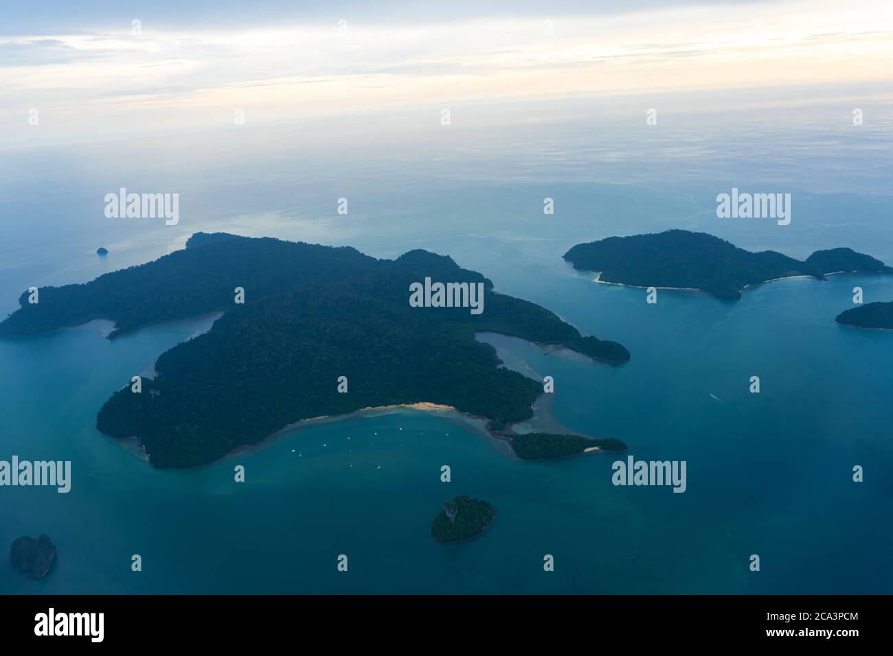 Small tropical islands aerial view from airplane Stock Photo - Alamy
