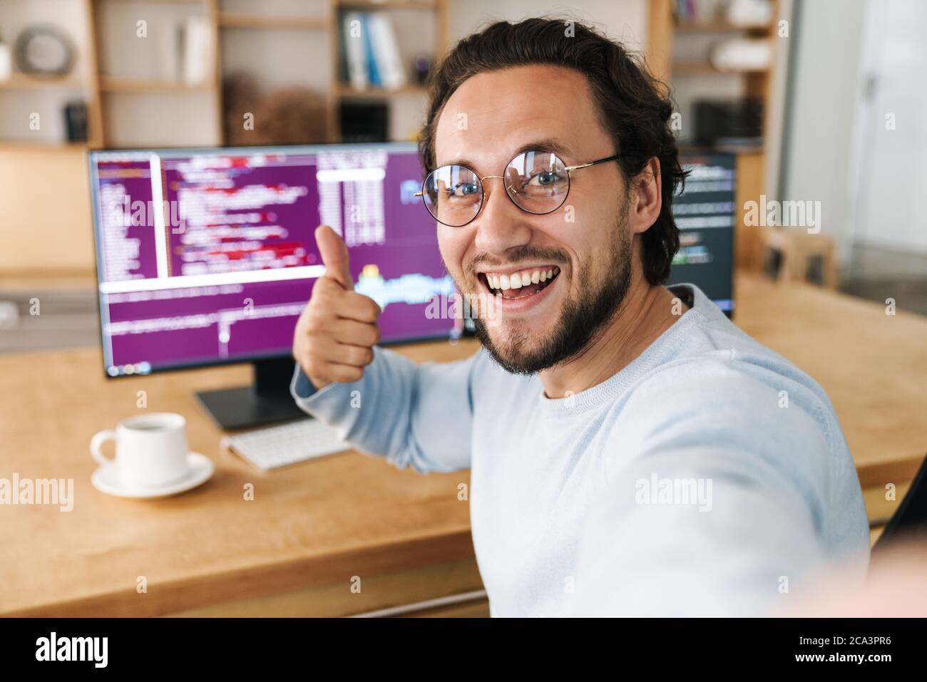 Photo smart happy programmer hi-res stock photography and images - Alamy